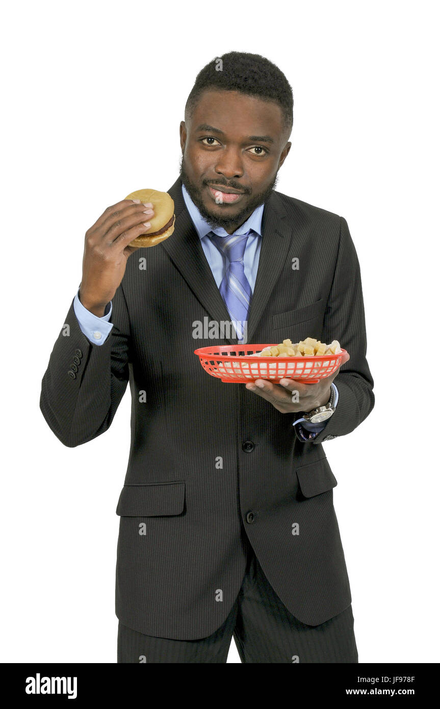 Man eating hamburger Stock Photo - Alamy