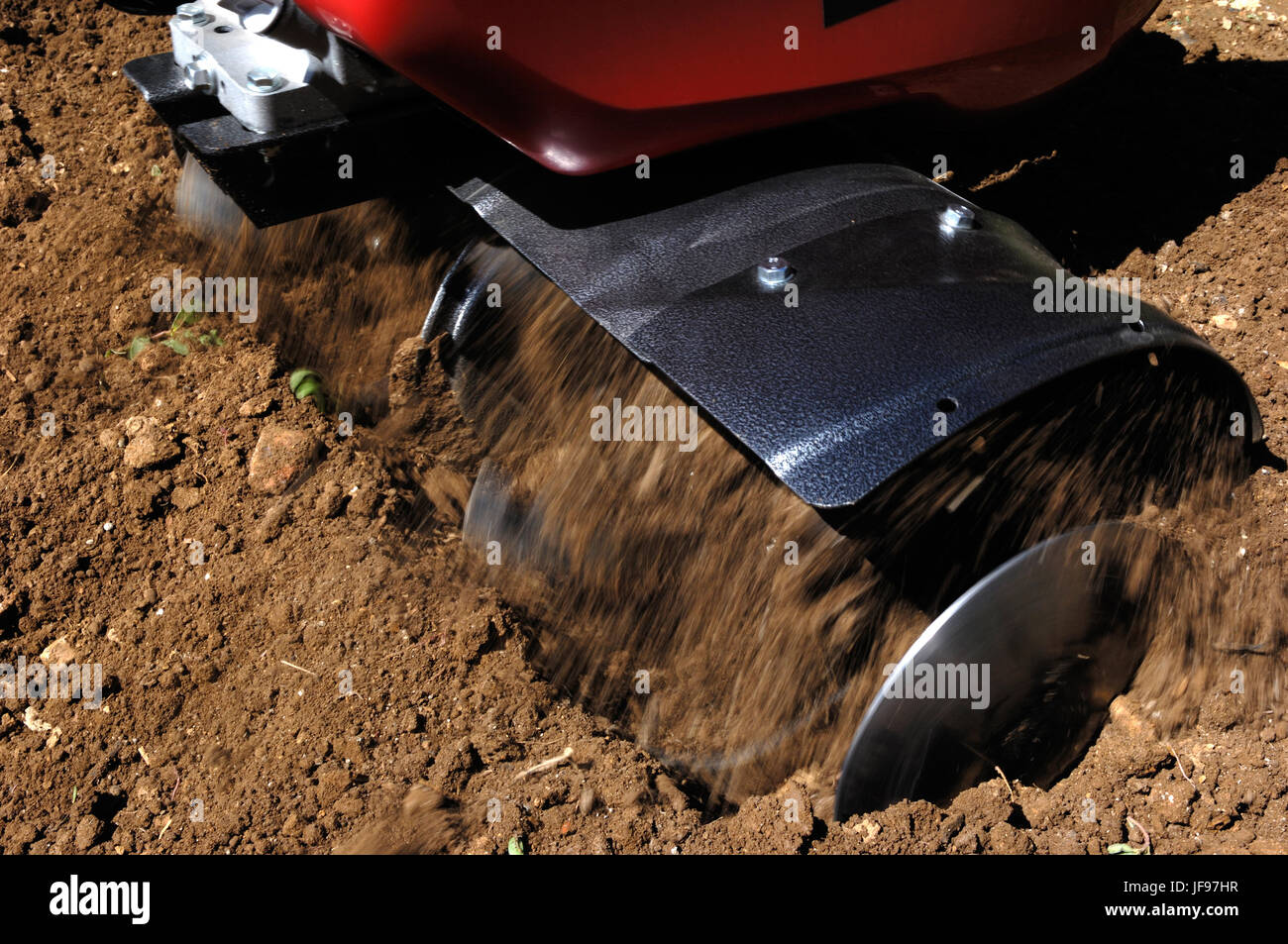detail Garden tiller to work Stock Photo - Alamy