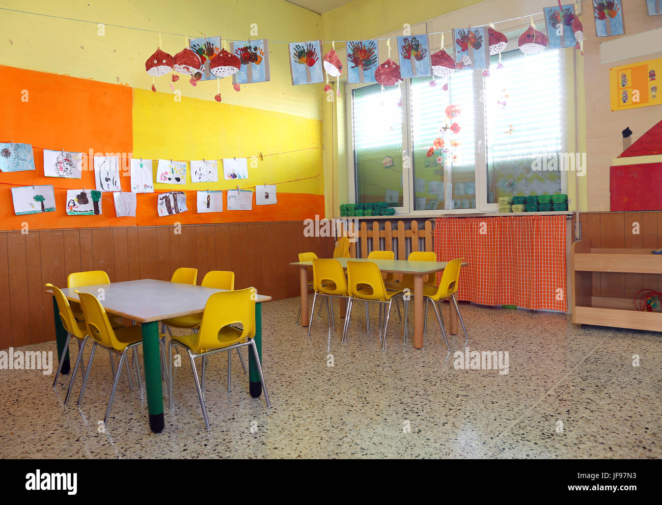 inside a classroom of a kindergarden without people and many ...