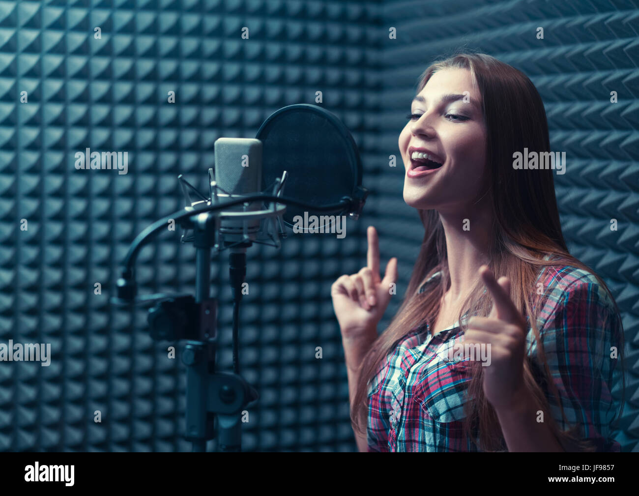 Woman in a recording studio Stock Photo - Alamy