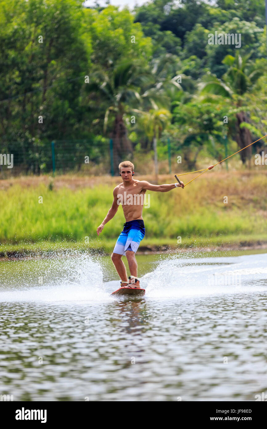 Man Wakeboarding in action. Phuket, Thailand Stock Photo - Alamy