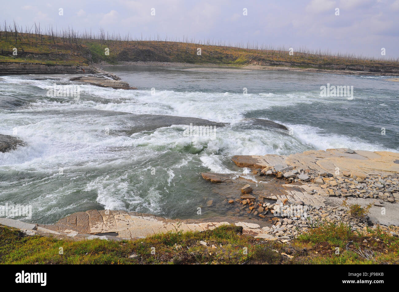 Rapids on the Putorana plateau. Rocks and jets of water Oron rapids on ...