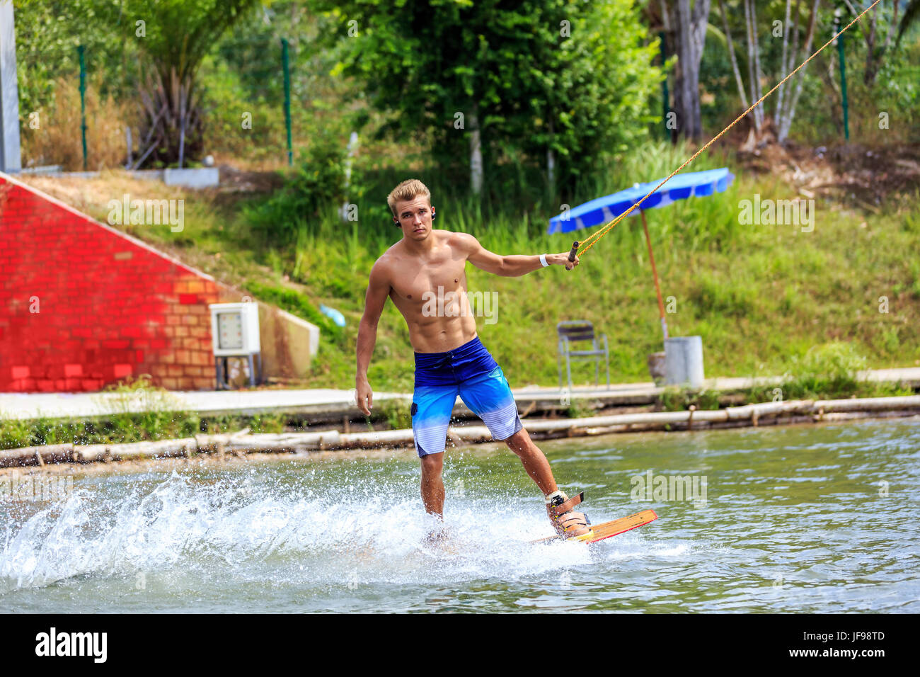 Man Wakeboarding in action. Phuket, Thailand Stock Photo - Alamy