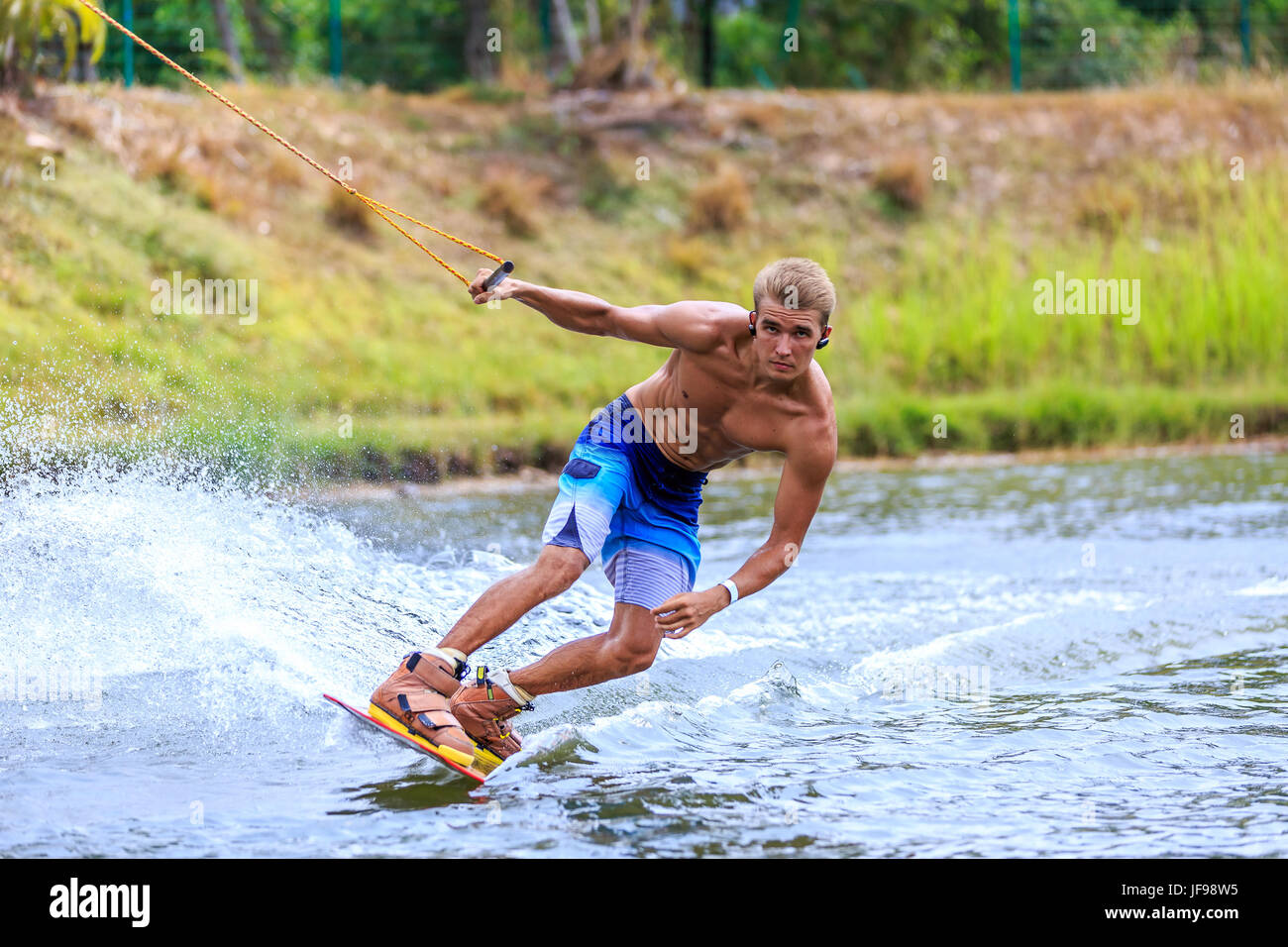 Man Wakeboarding in action. Phuket, Thailand Stock Photo - Alamy
