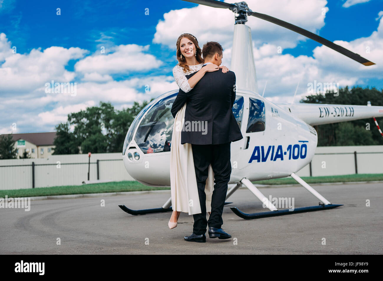 Beautiful couple helicopter hi-res stock photography and images - Alamy