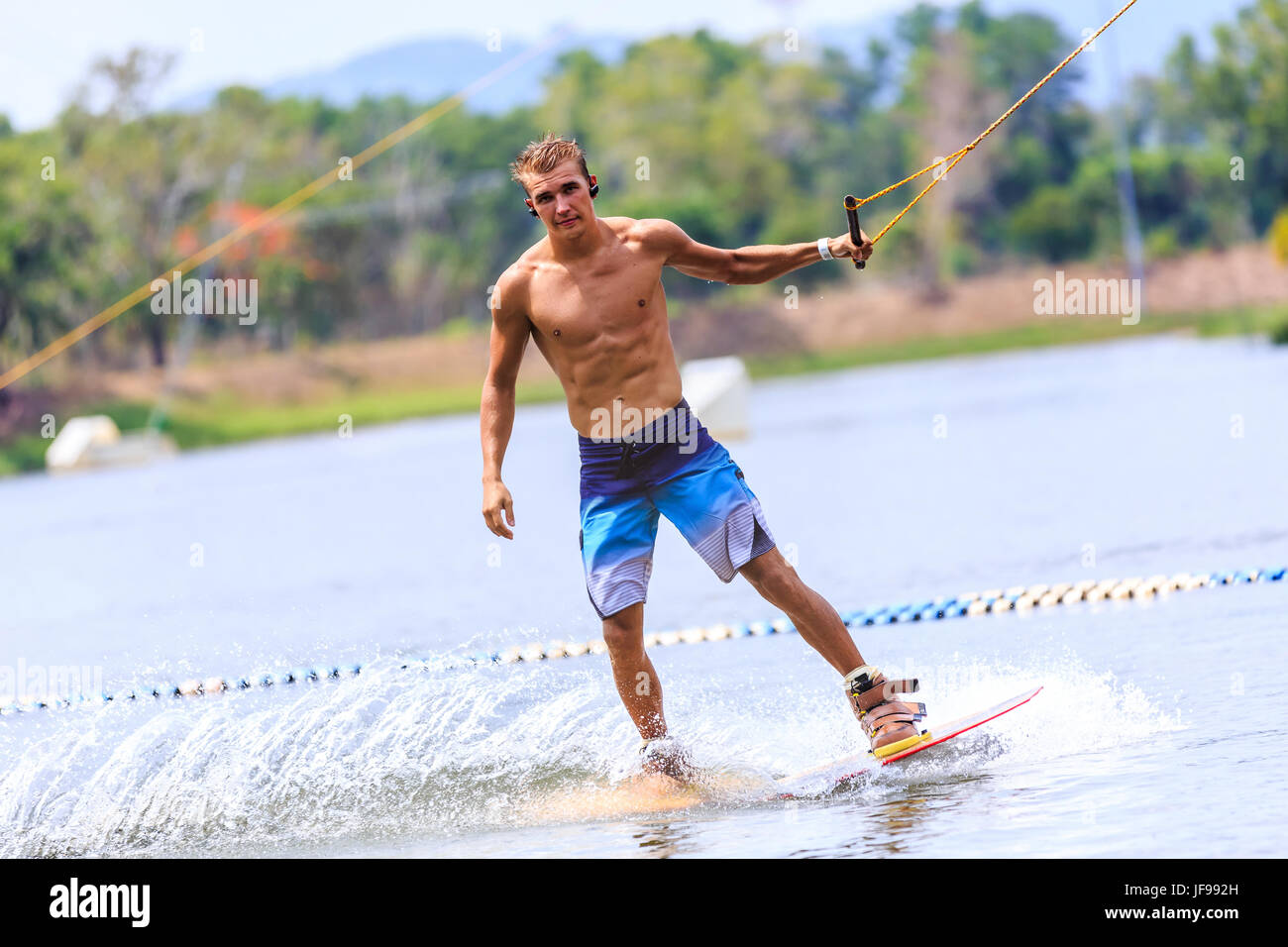 Man Wakeboarding in action. Phuket, Thailand Stock Photo - Alamy