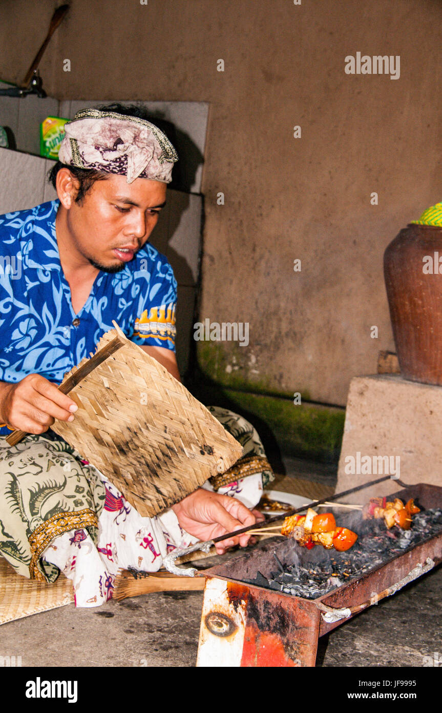 Ubud, Bali, Indonesia - August 01, 2013. Pork Meat Chop Cooked On The ...