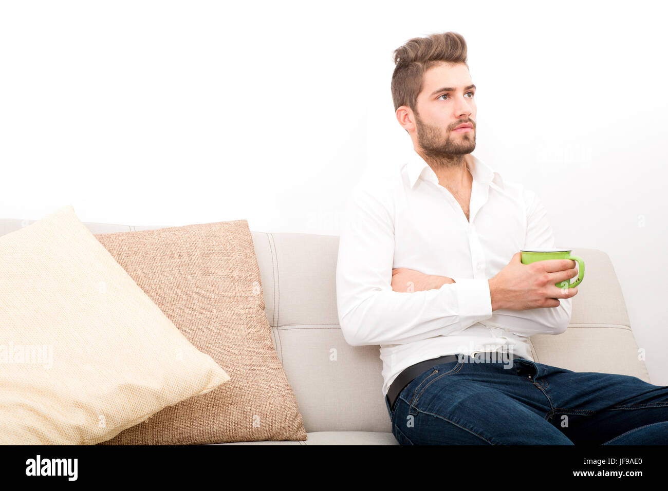 Couch portrait with coffee Stock Photo - Alamy