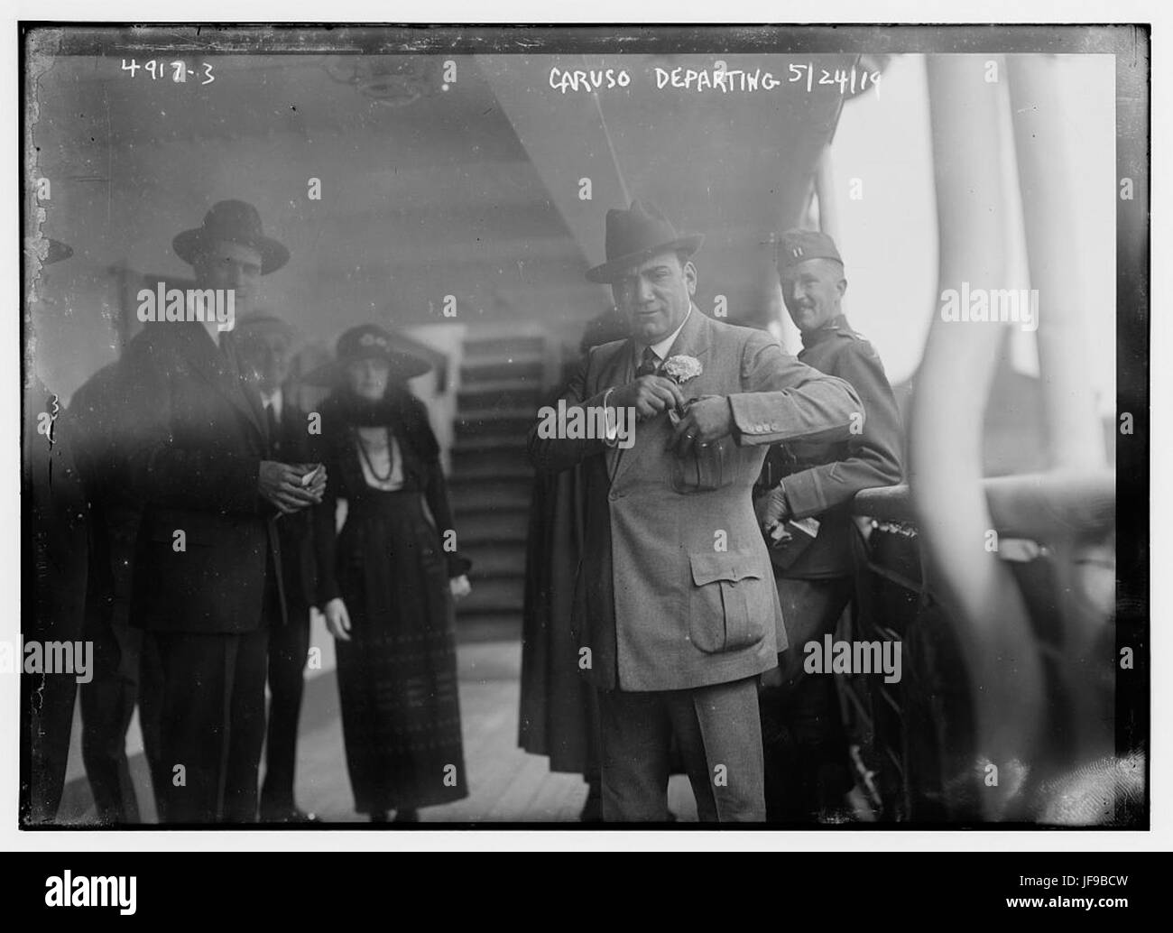 A historical image capturing the renowned Italian tenor Enrico Caruso ...