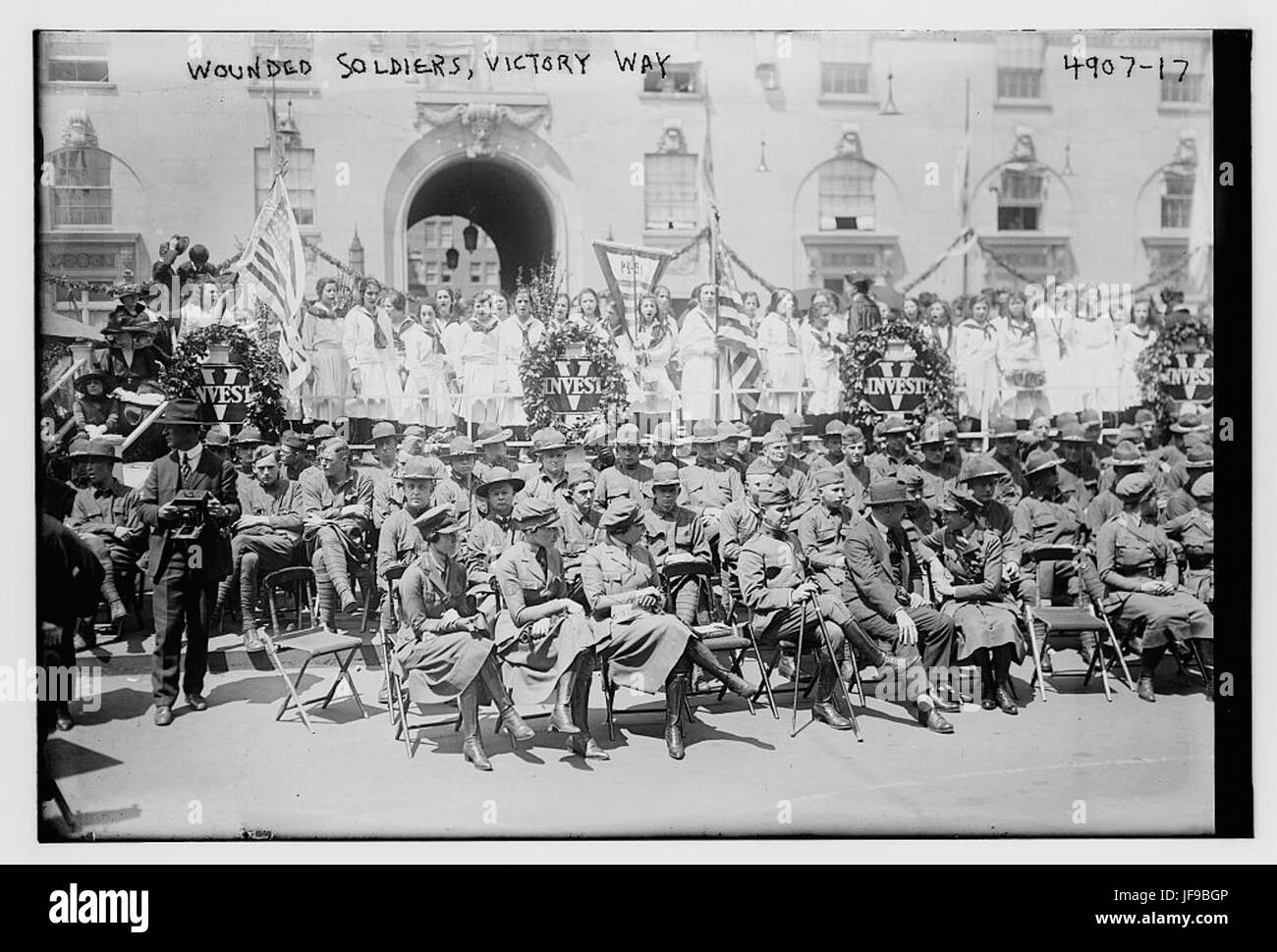 Wounded soldiers along Victory Way, a historical photograph capturing ...