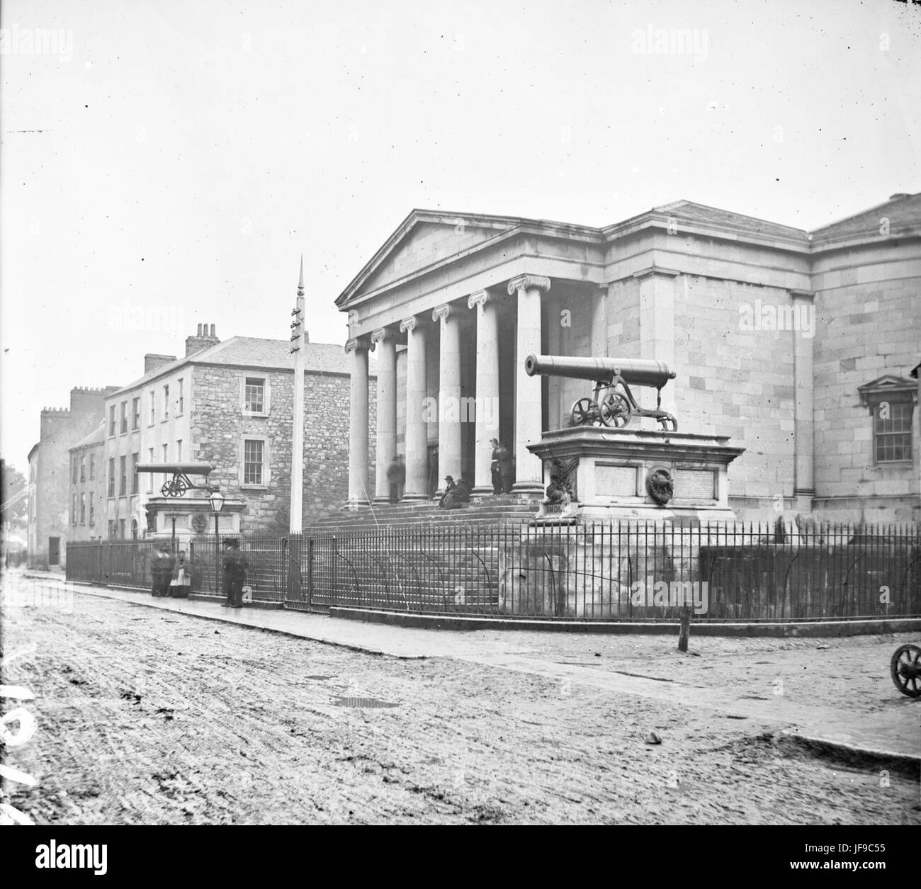 A historical photograph of a large public building with six columns in ...