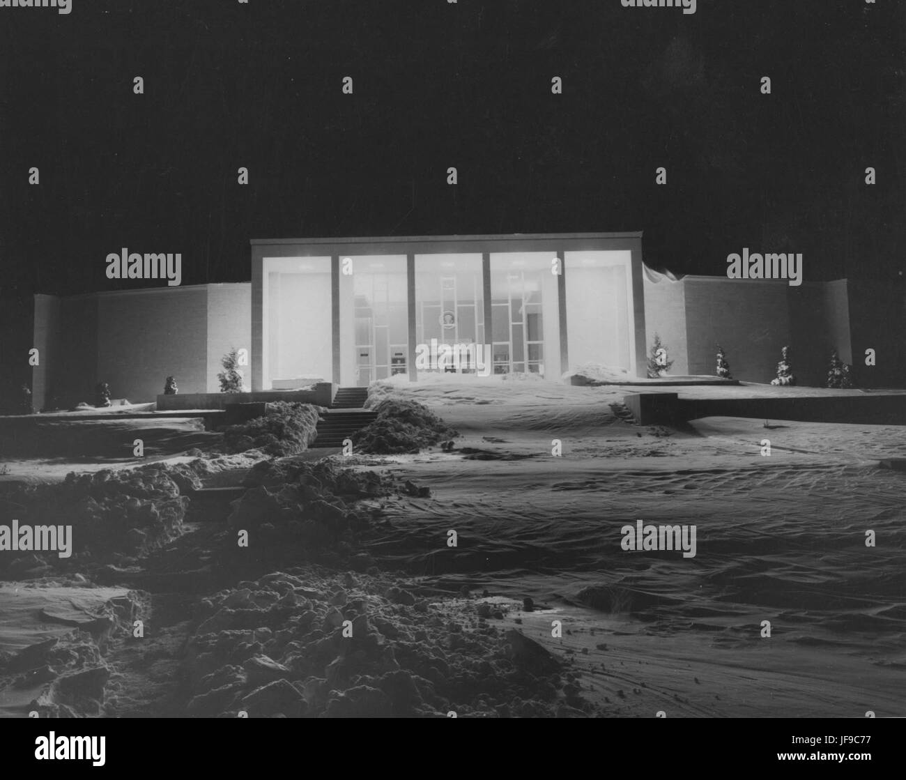 A striking photograph of the Harry Truman Presidential Library at night ...