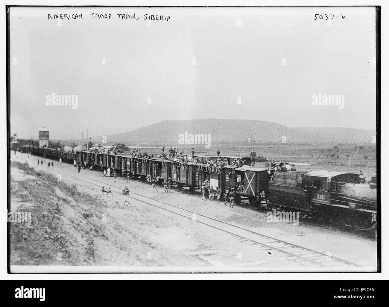 A historical photograph of an American troop train in Siberia ...