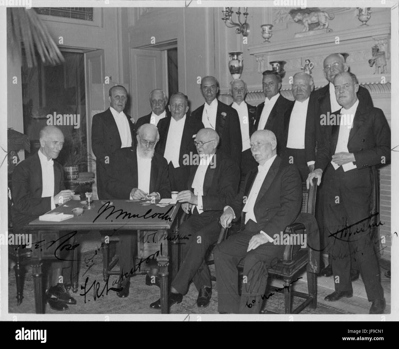 A photograph of chief justices and judges enjoying a game of cards ...