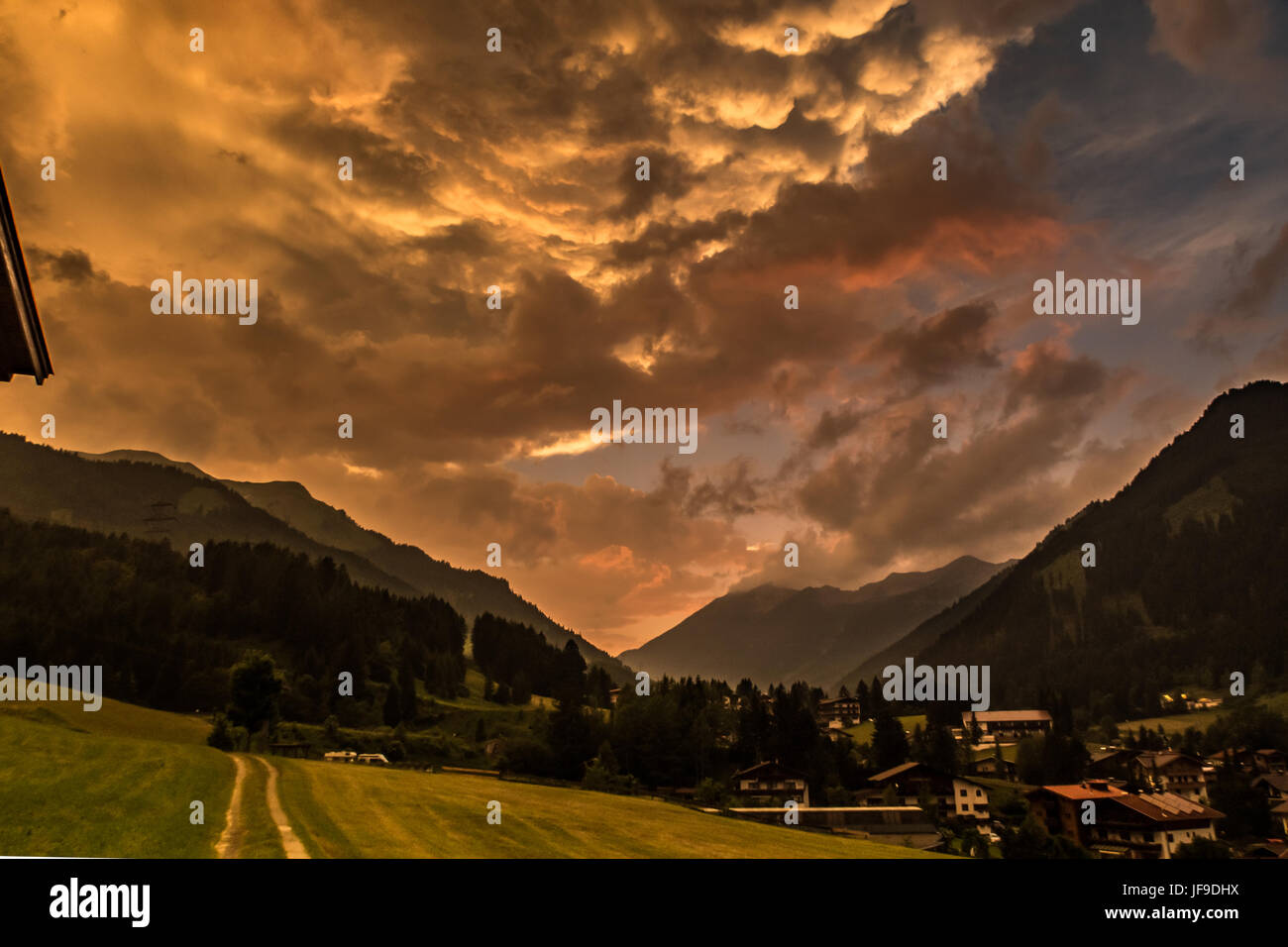 Apocalyptic landscape with mountains and clouds Stock Photo - Alamy