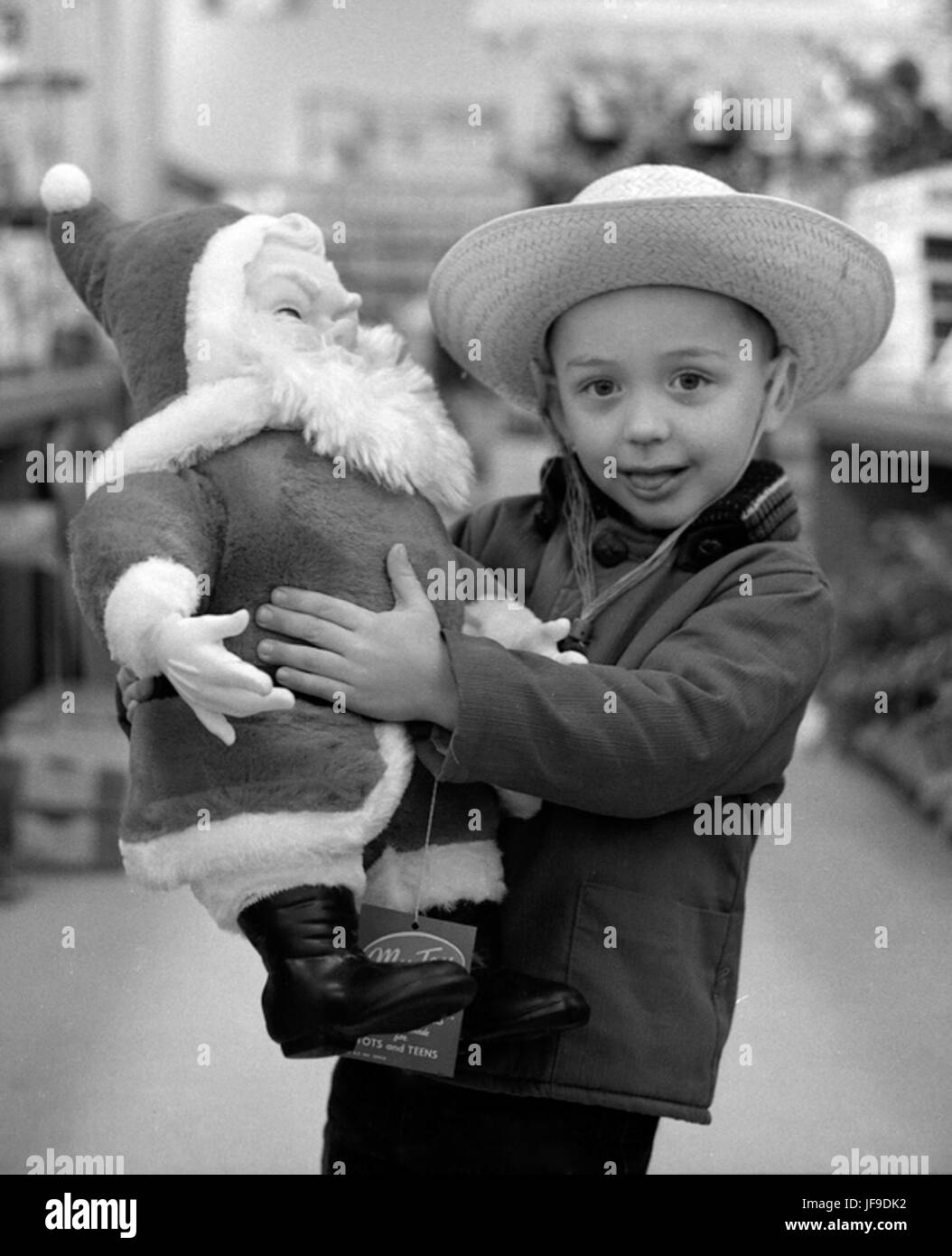 Richard Hatcher, 4, with Santa Claus doll in a Tallahassee Stock Photo ...