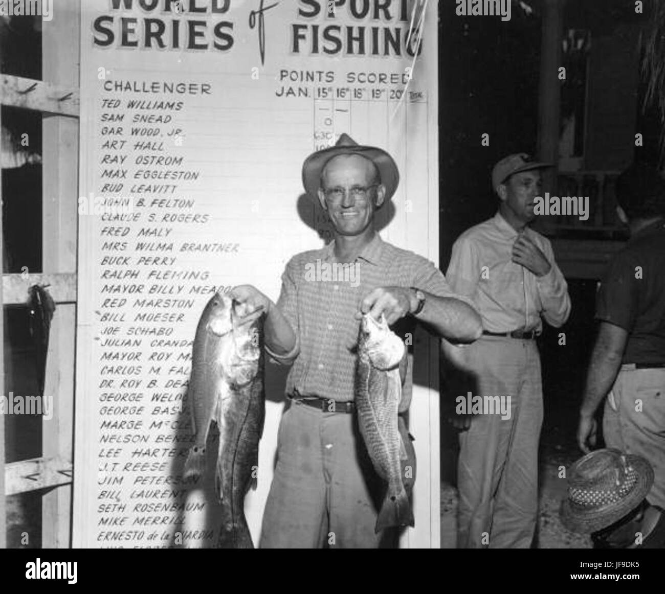 Buck Perry with his catch of snook and two redfish Stock Photo - Alamy