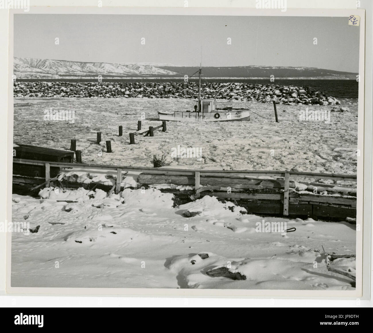 A dramatic photograph showing the ice-choked entrance channel to Homer ...