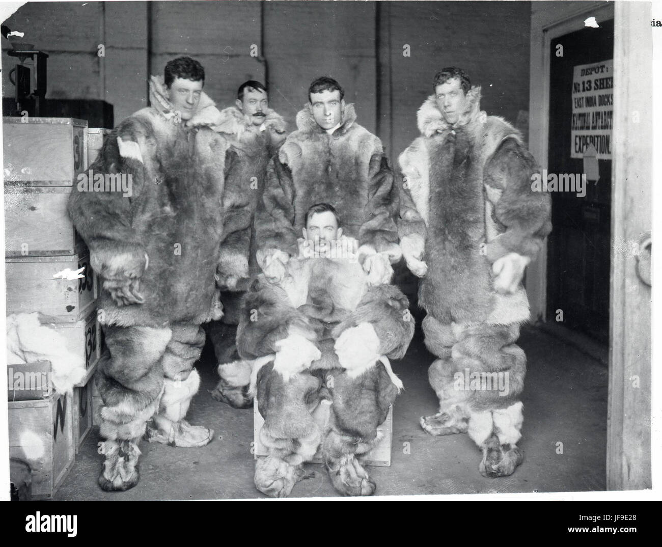 A photograph showing five individuals wearing traditional Eskimo attire ...