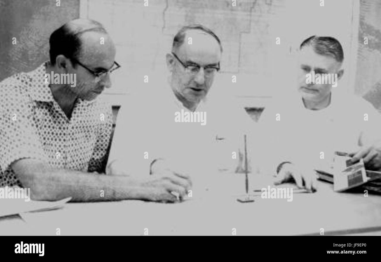 A historical photo of Simon Gingerich, Nelson Kauffman, and Lawrence ...