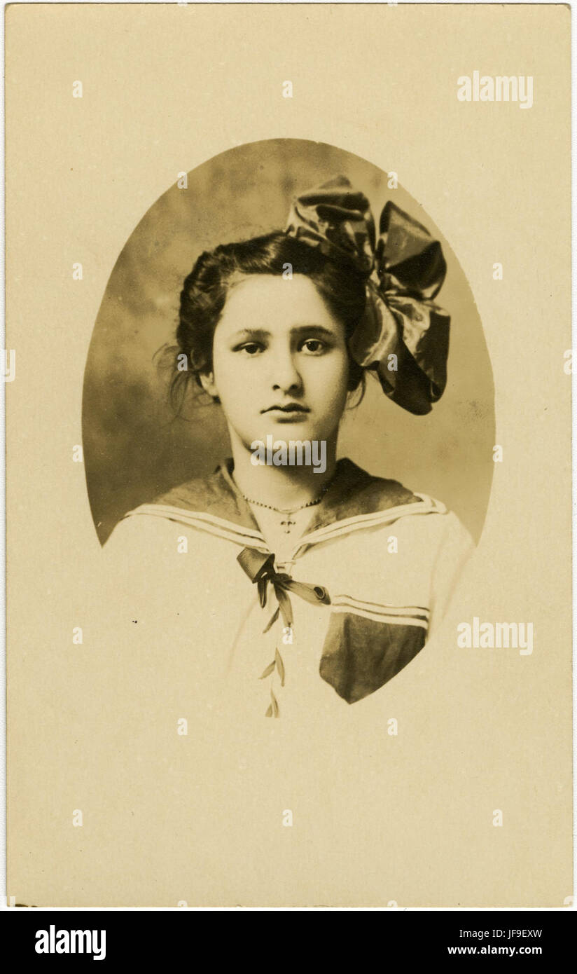 A captivating portrait of an unidentified girl, capturing a moment of ...