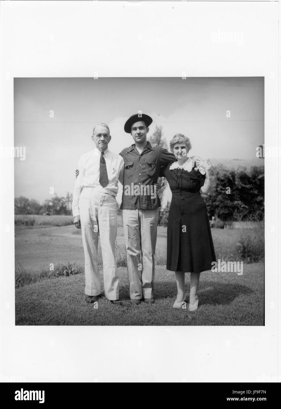 A historic photo of Luther and Lizzie Hamilton with an unidentified man ...
