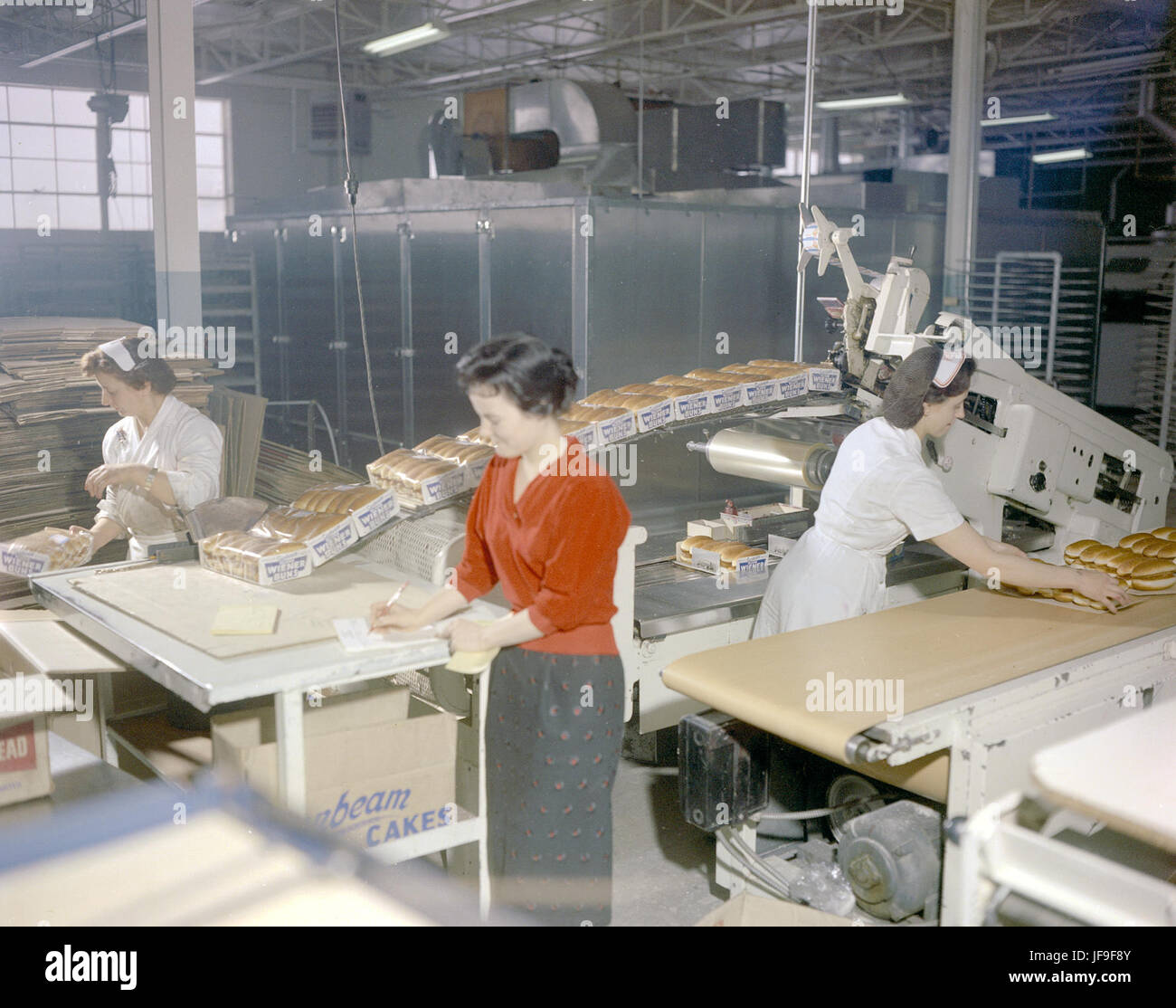 Witness the art of boxing fresh buns at the Western Bakery in Calgary ...