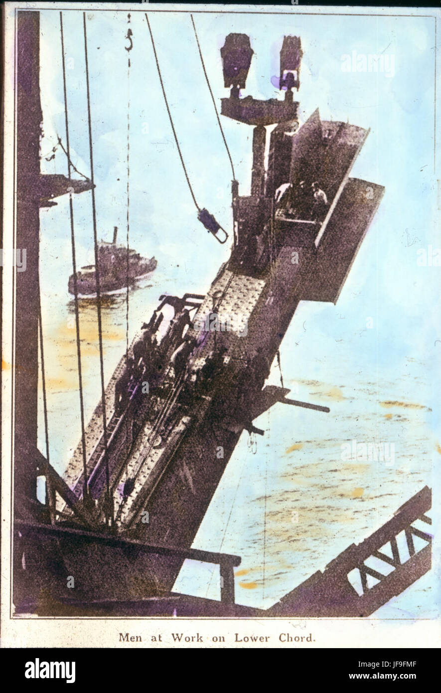 An image of men working on the construction of a lower chord, possibly ...