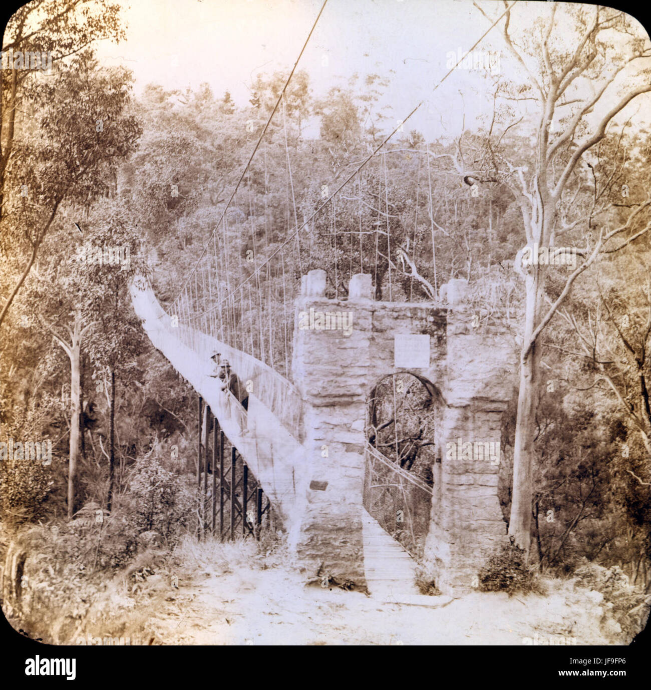 A historical photo of the suspension bridge at Mooney Mooney, New South ...