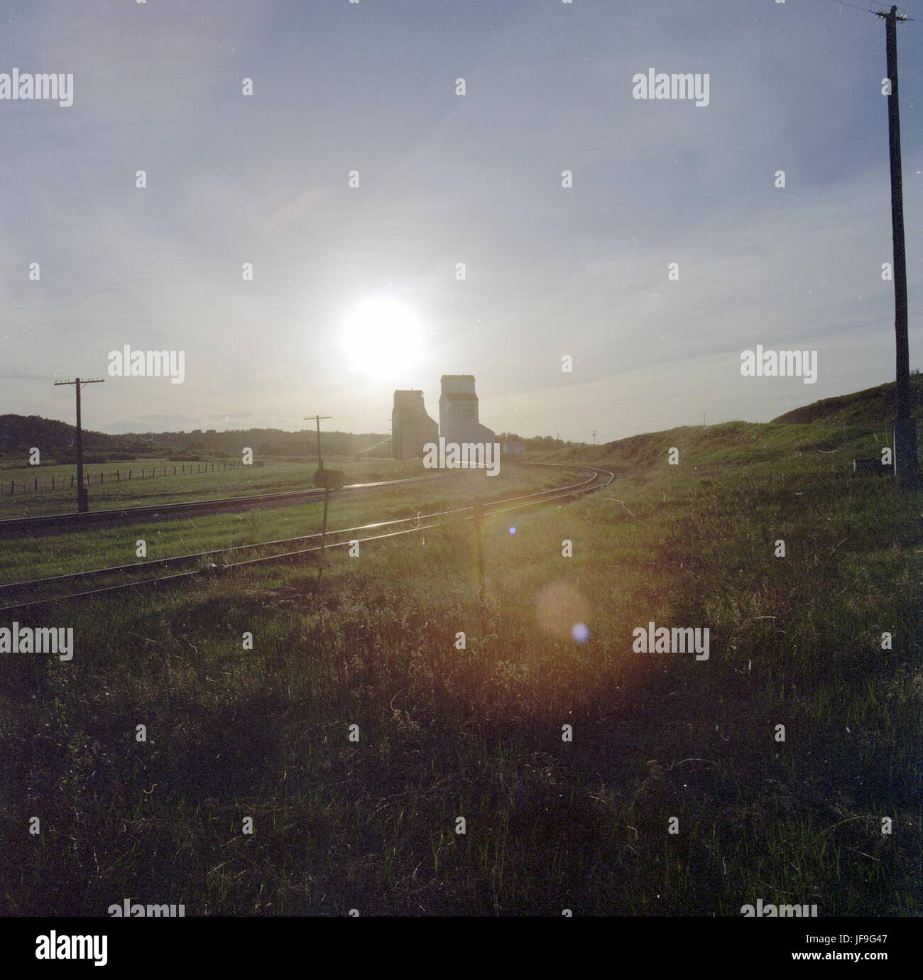 A stunning photograph of grain elevators at sunset in Gwynne, Alberta ...