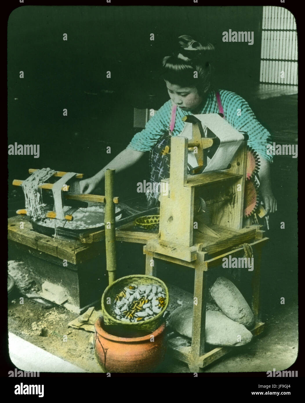 Taking Silk From Cocoons Stock Photo - Alamy