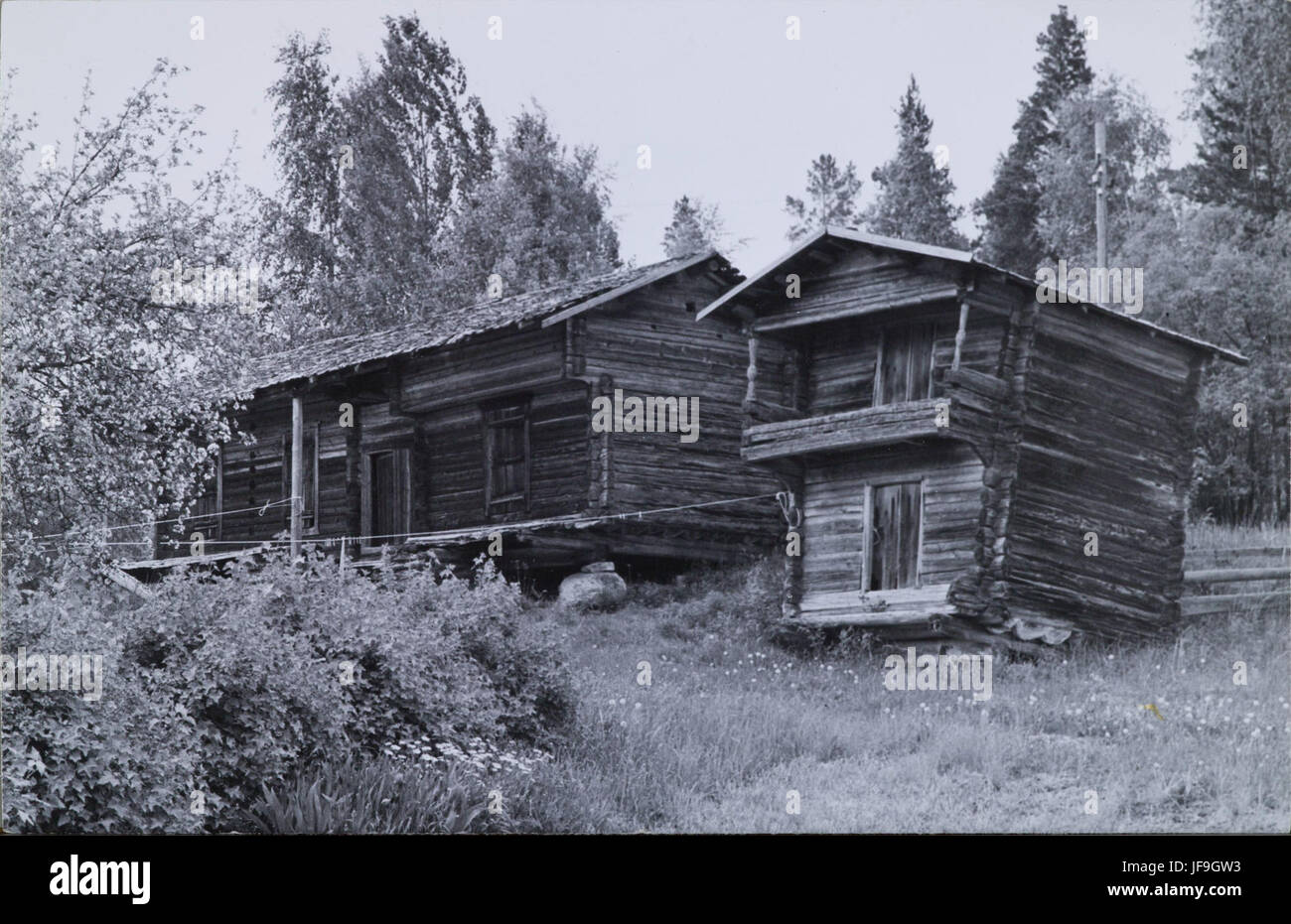 This image captures the timber barns of the Kovala house, showcasing ...