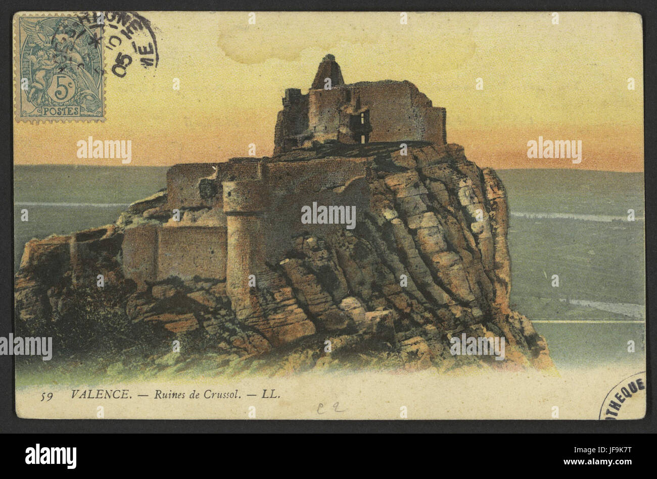 A photograph of the ruins of Crussol Castle in Valence, France, capturing the eerie beauty and ...