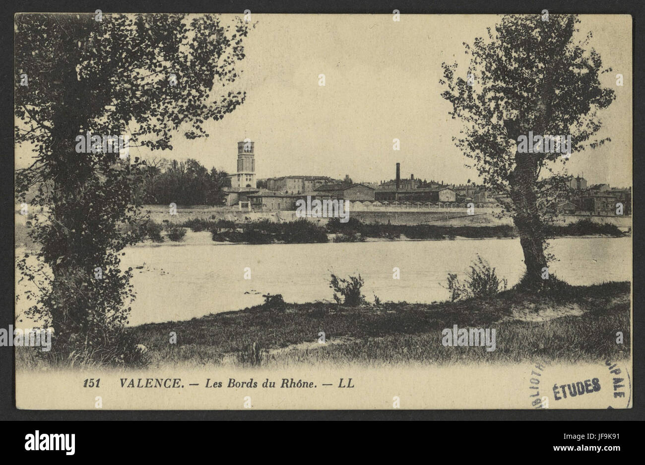 The scenic banks of the Rhône River in Valence, France, showcasing the ...