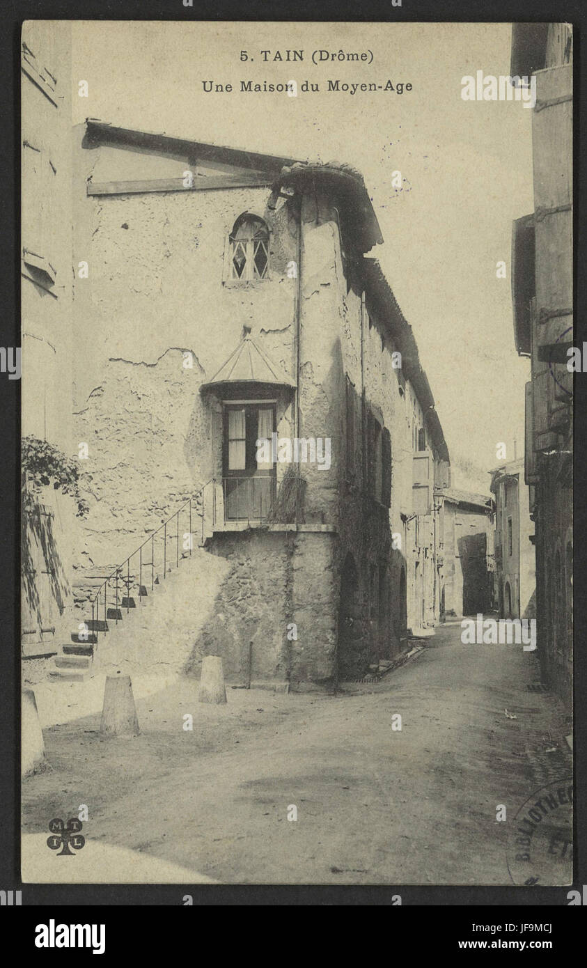 A photograph showcasing a medieval house in Tain, Drôme, France ...