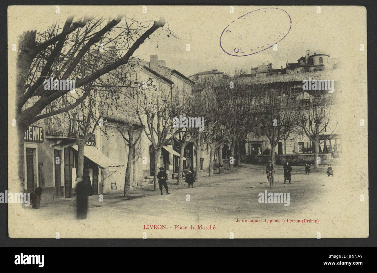 The bustling Place du Marché in Livron, France, a central location for ...