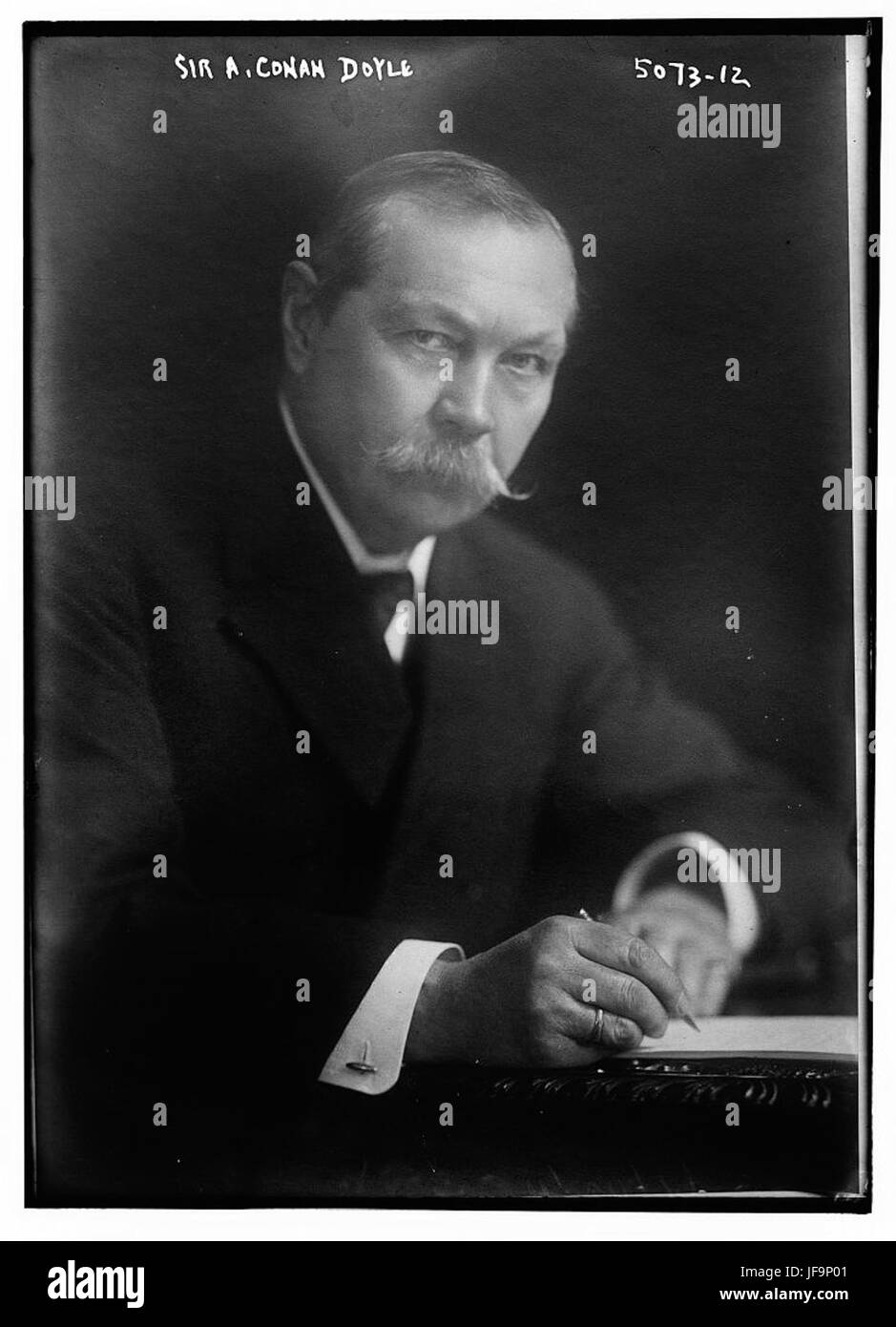 A portrait of Sir Arthur Conan Doyle, the famous British writer known ...