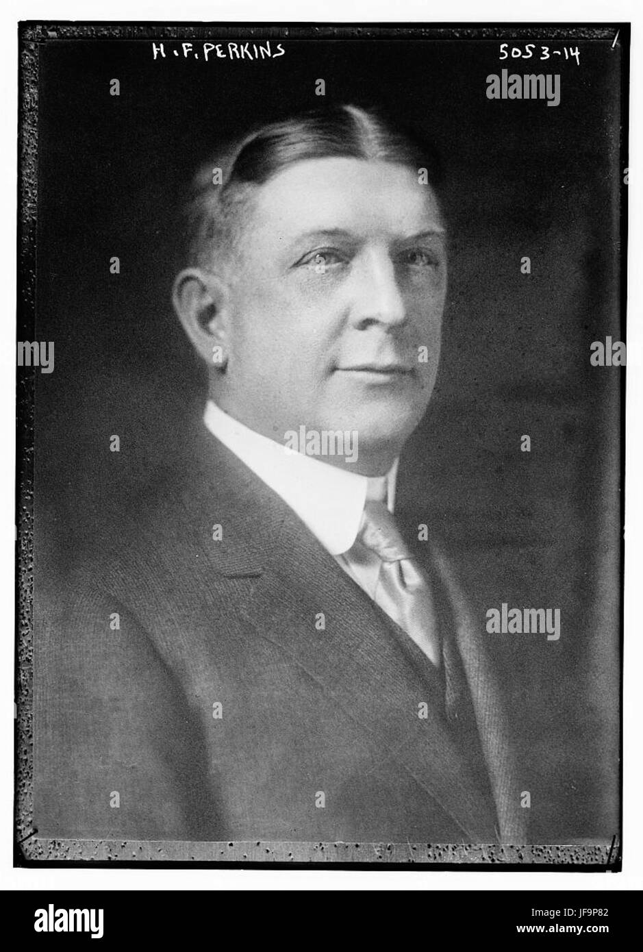 A portrait of H.F. Perkins, a prominent historical figure, captured in ...