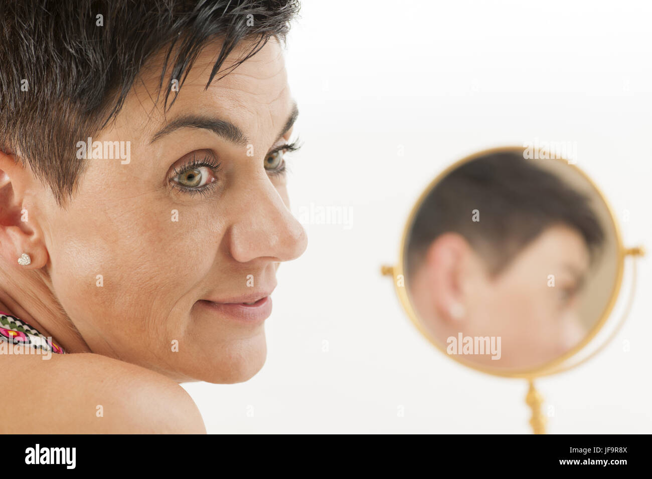 Womans face with mirror side view Stock Photo - Alamy