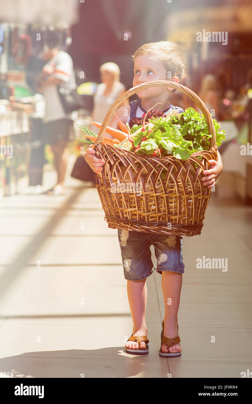 Child fruits store basket hi-res stock photography and images - Alamy