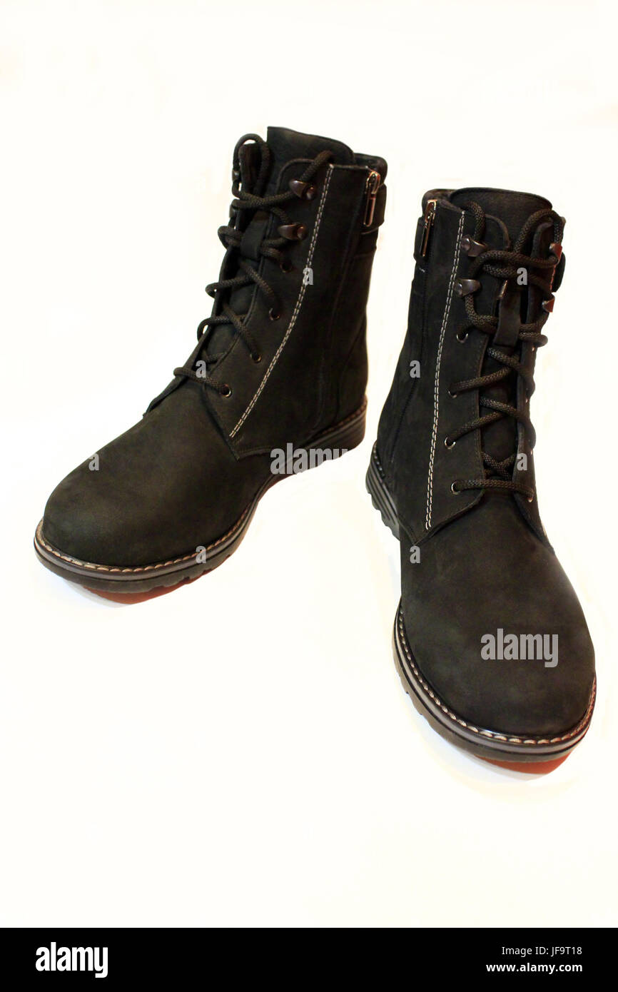 Black winter boots hi-res stock photography and images - Alamy