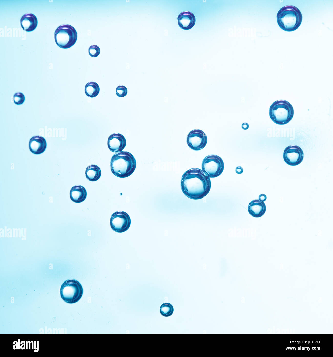 Water bubbles in a glass container close up. Studio shot Stock Photo ...