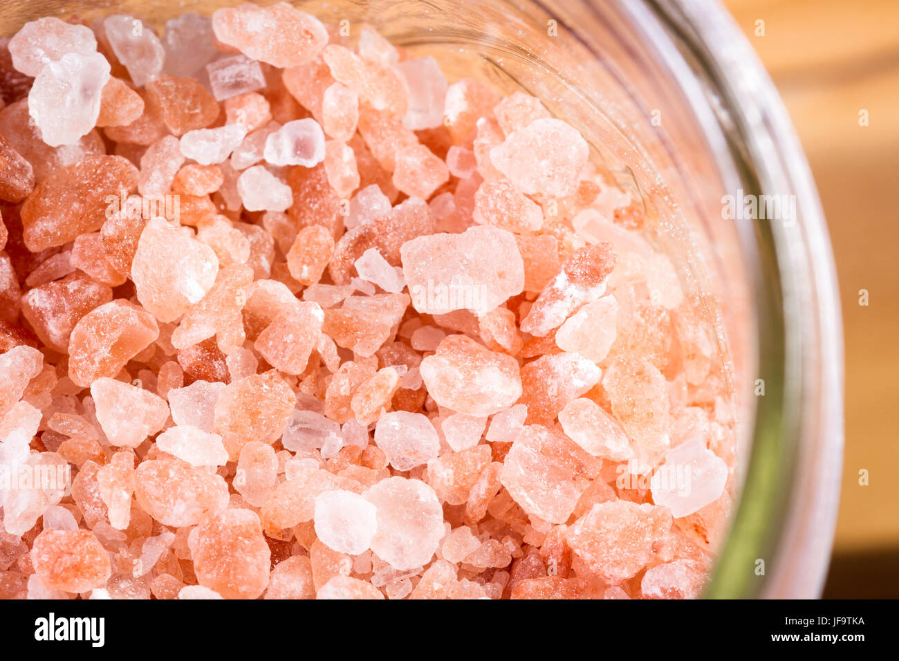 Himalayan pink salt crystals in different shapes and sizes and varying ...