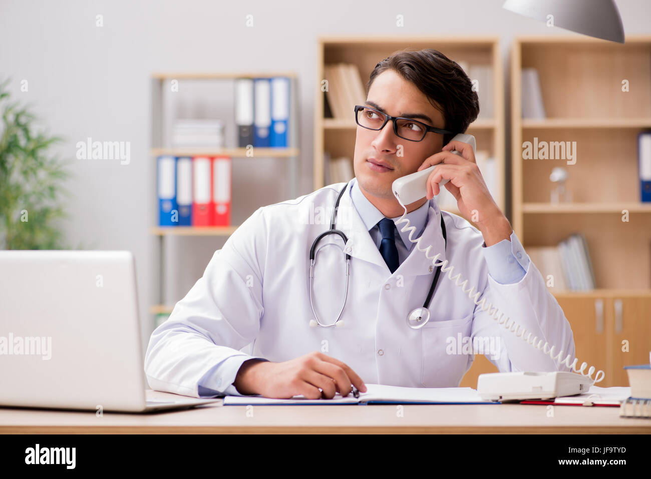 Consultation over phone hi-res stock photography and images - Alamy