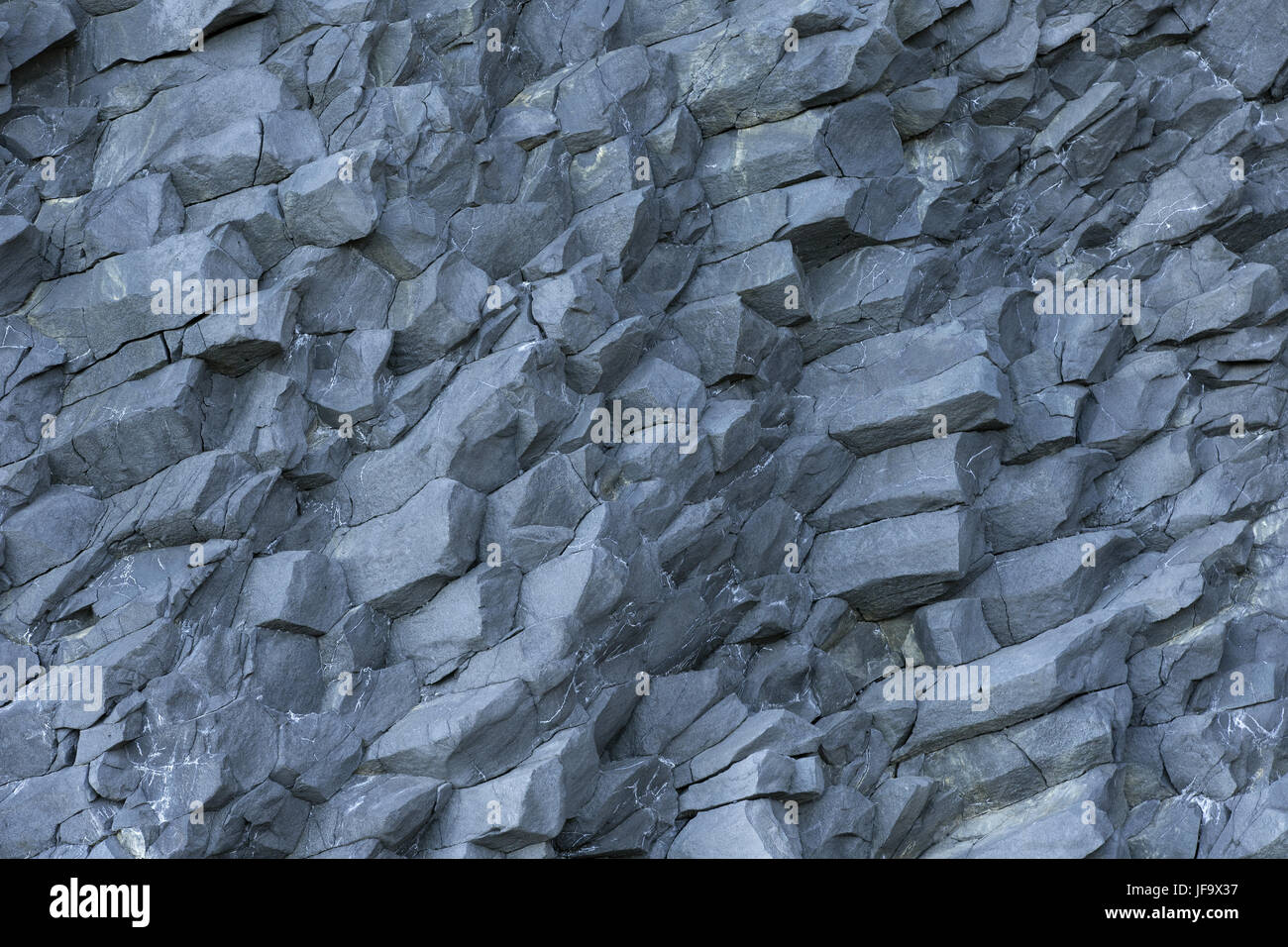 basalt wall close up as background Stock Photo - Alamy