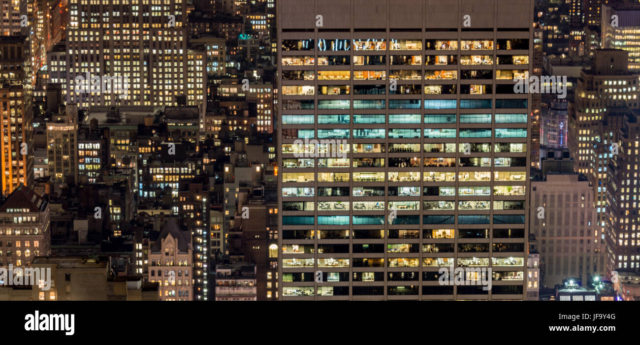 Office windows illuminated at night Stock Photo - Alamy
