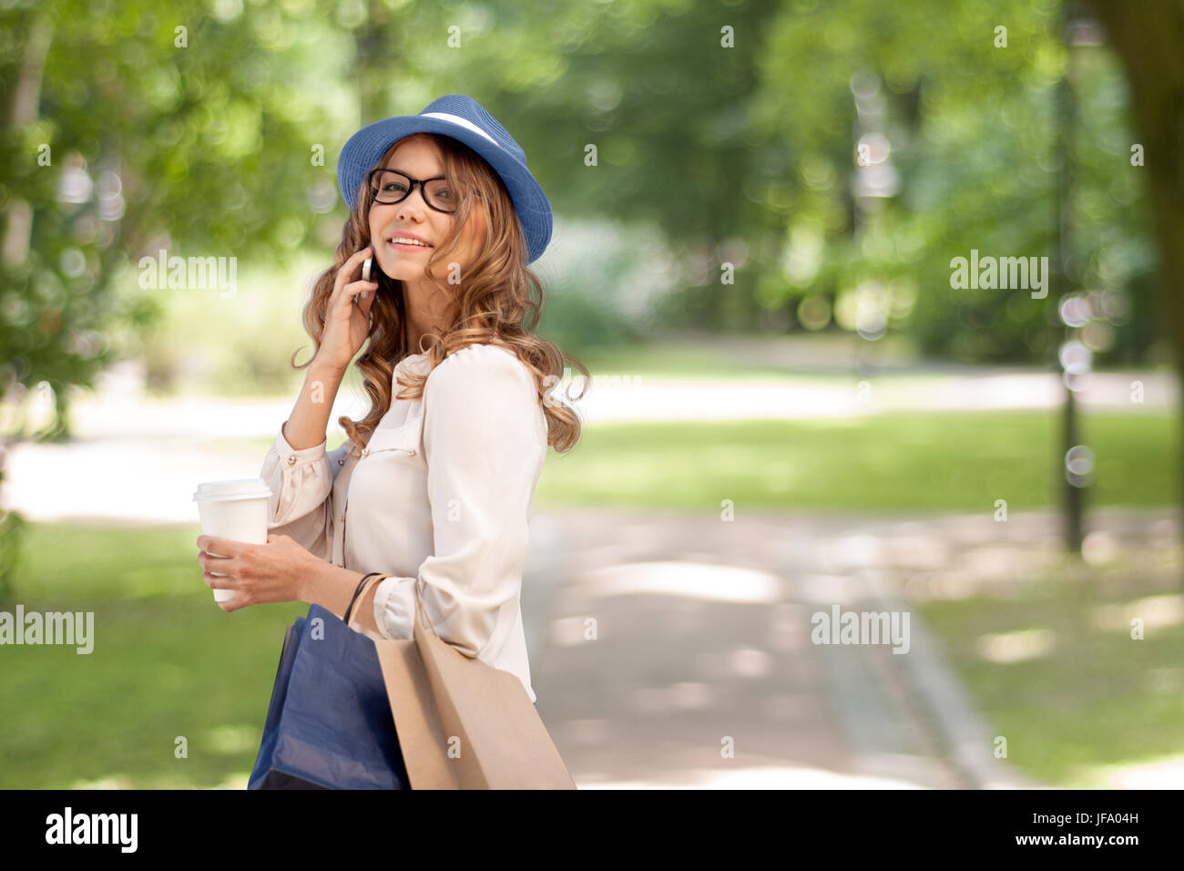 Talking and smiling Stock Photo - Alamy