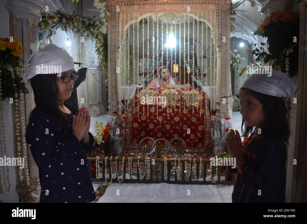 Lahore, Pakistan. 30th June, 2017. Pakistani members of Sikhs community ...