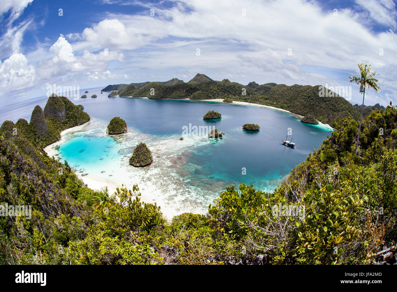 Beautiful limestone islands surround a remote lagoon, just north of the ...