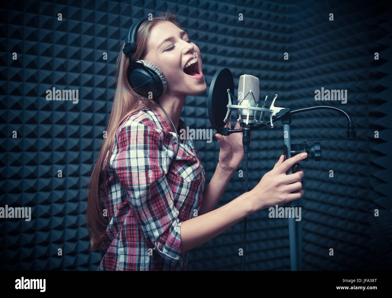 Woman in a recording studio Stock Photo - Alamy
